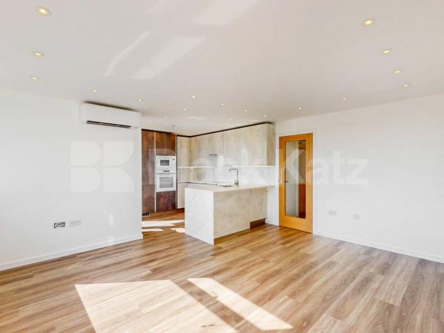 A stunning fully renovated three bedroom apartment finished to an exceptional high standard throughout
