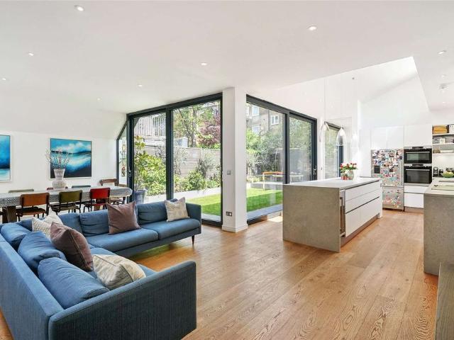 A stunning five/six bedroom family house on a pretty tree lined road in Wandsworth