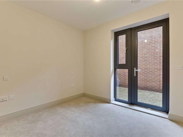 A stunning ground floor apartment with two double bedrooms, two bathrooms, reception room and high specification kitchen