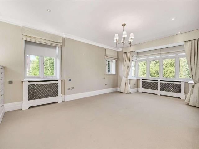 A stunning, semi detached, six bedroom family house in a prime village address location