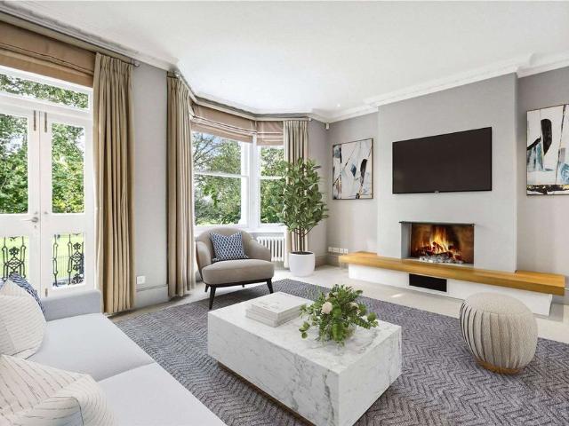A stunning six bedroom family house overlooking Eel Brook Common in Fulham