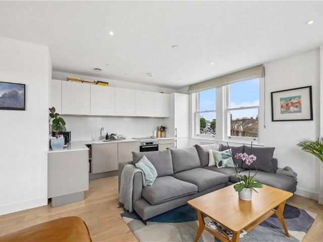 A stunning two bedroom, two bathroom apartment on the top floor in the heart of Munster Village. EPC rating B