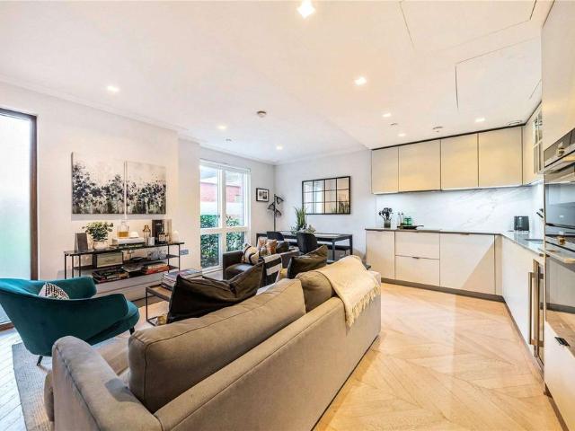 A stunning 2 bedroom contemporary apartment with its own private entrance and off street parking