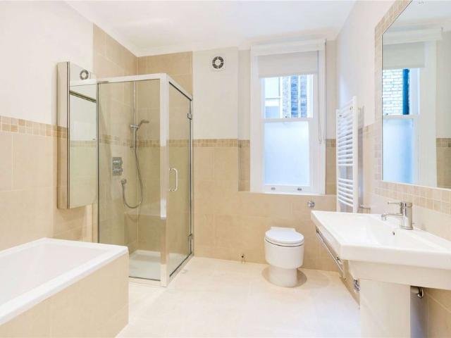 A stunning 5 bedroom family home, filled with period features and enjoying a close proximity to amenities of Belsize Park
