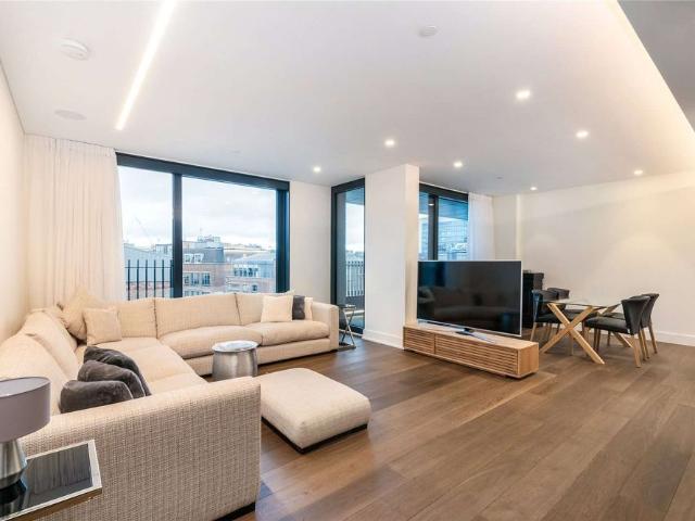 A stylish 2 bedroom apartment on the fifth floor of this exclusive development, with views over the residents' garden