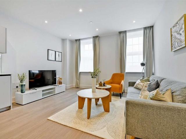 A stylish and fully furnished two bedroom apartment with car parking in The Factory building at The Horlicks Quarter
