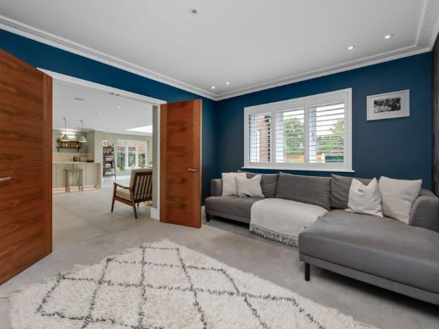 A substantial detached family house with a landscaped garden in Cobham