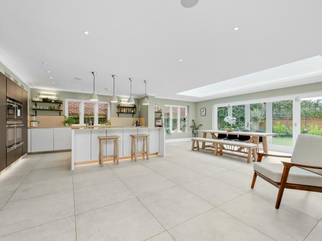 A substantial detached family house with a landscaped garden in Cobham