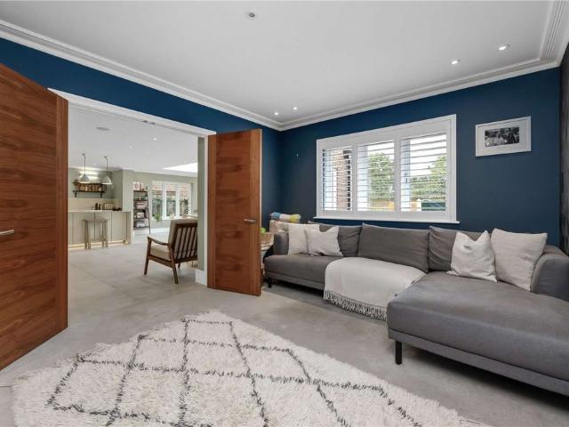 A superb seven bedroom family home situated in a popular residential road just 0.7 of a mile from Oxshott station