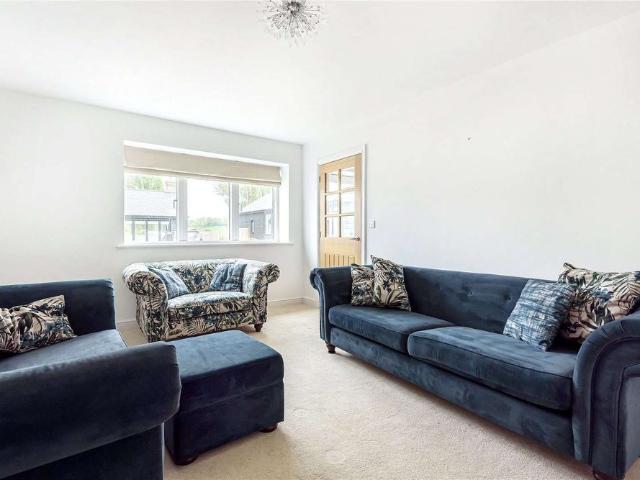 A superbly presented family home set in a private development