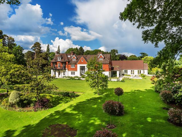 A Surrey Hills estate with 14 acres, a newly rebuilt house and far reaching views