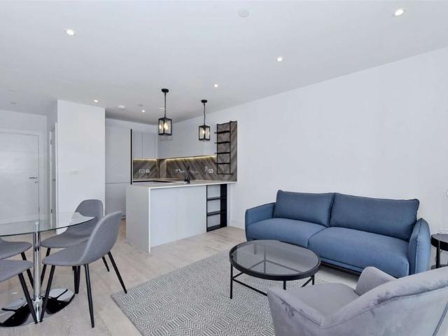 A second floor apartment with south facing balcony and car parking for one car offering far reaching views in the sought after Horlicks development by Berkeley Homes