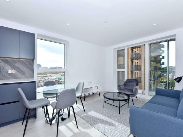 A second floor furnished apartment with south facing private balcony in the sought after Horlicks Artesian House development by Berkeley Homes