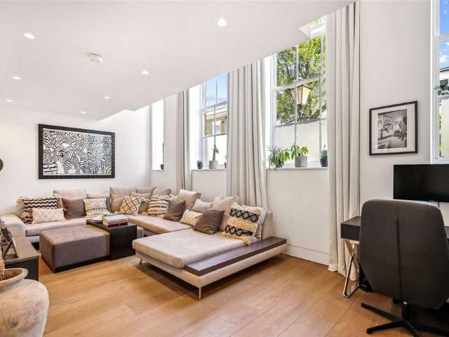 A sensational two bedroom School house conversion, nestled within a secure gated development