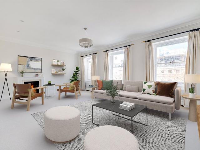 A smart, recently renovated two bedroom, two bathroom flat situated on the third floor with lift of this well looked after residential building. EPC rating C | Council Tax Band