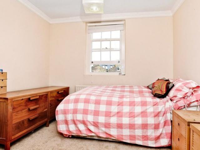 A spacious and centrally located apartment that has been previously refurbished and benefits from a separate study