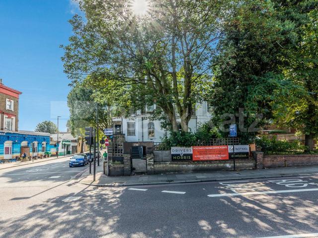 A spacious four double bedroom flat set on the top two floors of a conversion