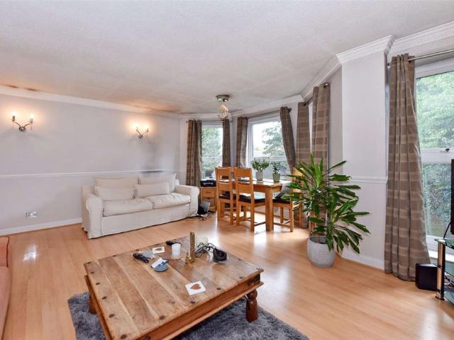 A spacious two bedroom apartment with off street parking and garage in a peaceful setting