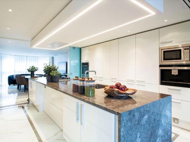 A spectacular and unique newly refurbished interior designed duplex Penthouse apartment