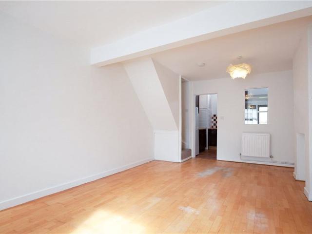 A two bedroom mid terrace Victorian house, benefitting from off street parking and enclosed rear garden