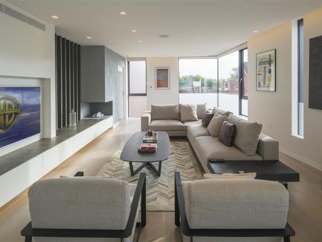 A unique, contemporary home featuring a private roof terrace offering panoramic views of the London skyline in Hampstead, NW3