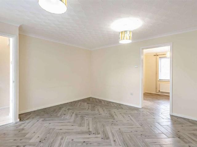 A well situated three bedroom house with garden and garage