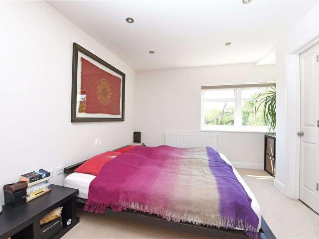 A well presented five bedroom family house on a residential road in North Kingston close to Richmond Park