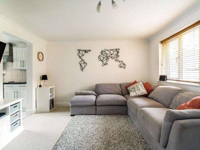 A well presented two bedroom ground floor apartment with allocated parking