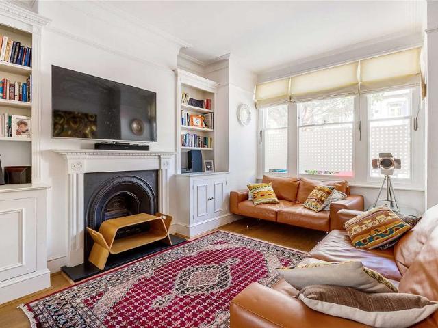 A wonderful four bedroom family home within the Wimbledon Park grid