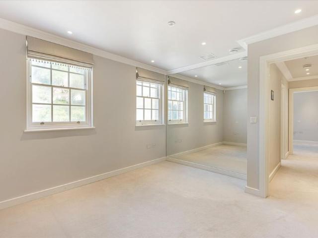A wonderfully light recently renovated four bedroom house quietly tucked away in Somerset Square, W14