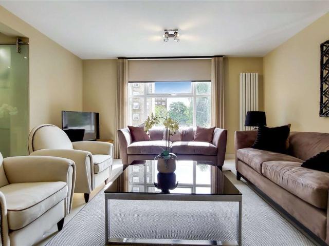 A 3 bedroom flat set over the second floor of a portered residential complex with residents parking
