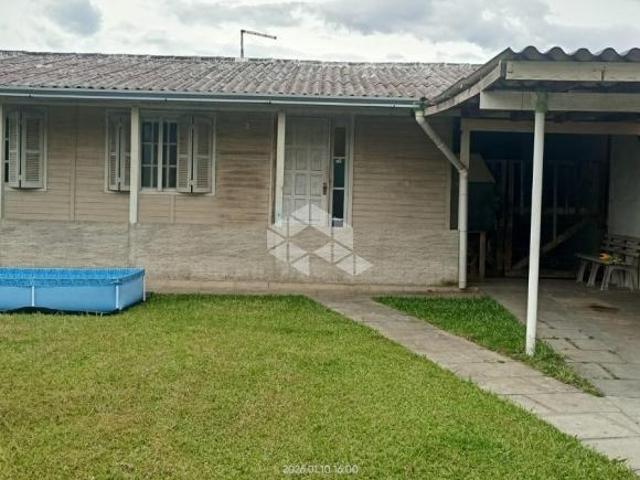 Aconchegante casa com 3 quartos mais edícula para venda bairro Ponta Grossa