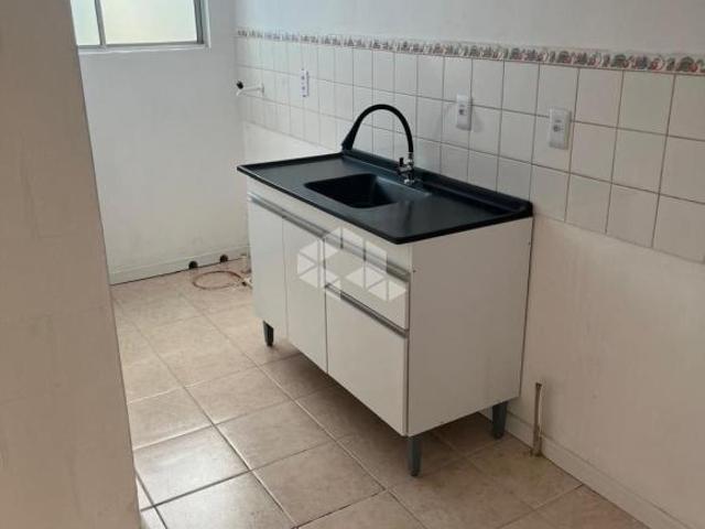 Aconchegante apartamento com 2 dormitórios