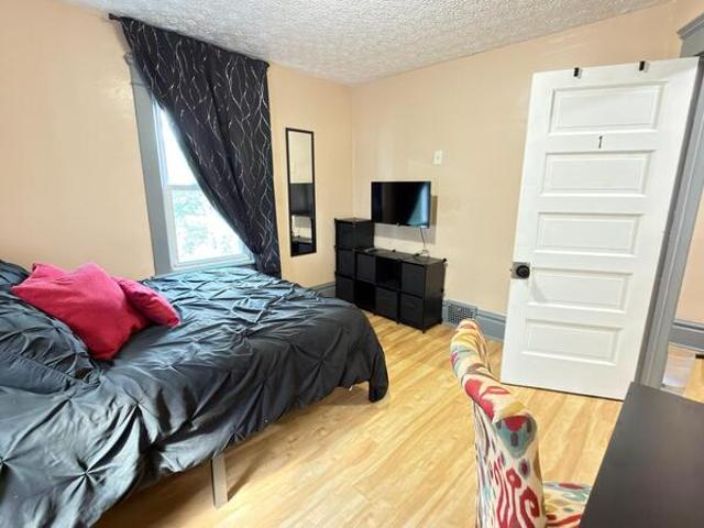 Affordable Akron Rooms | Near I 77, Downtown & Transit