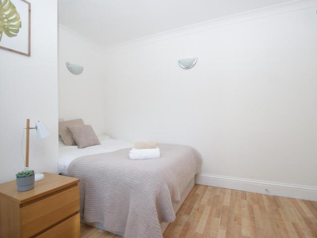 Alluring double ensuite bedroom in a 4 bedroom house near East Acton metro station Has a Room