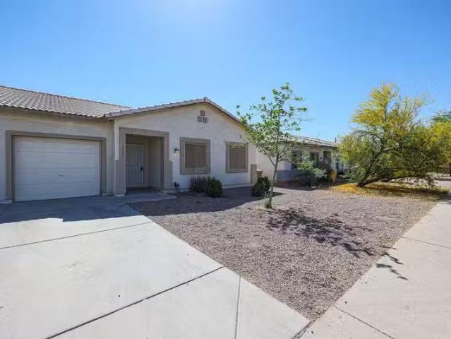ALL TILE 4 BR ~ 2 BA ~ Garage ~ Backyard 6837 N 81st Dr