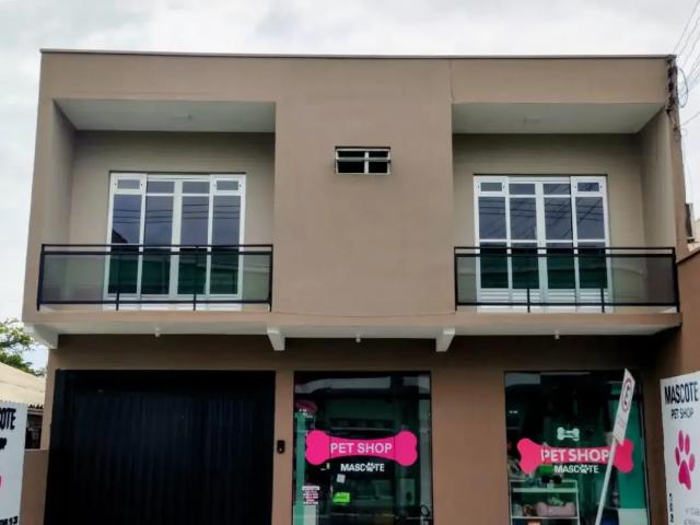 Aluga se lindo sobrado com 2 dormitorios sendo 1 suíte + closet + 2 sacadas