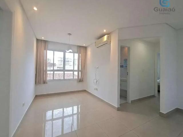 Alugo lindo Apartamento de 2 dormitórios, suíte e garagem demarcada na Aparecida em Santos