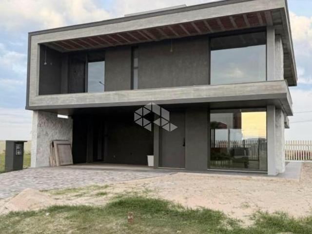 Ampla casa NOVA com 04 suítes no Condomínio Arenas Curumim em Capão da Canoa RS