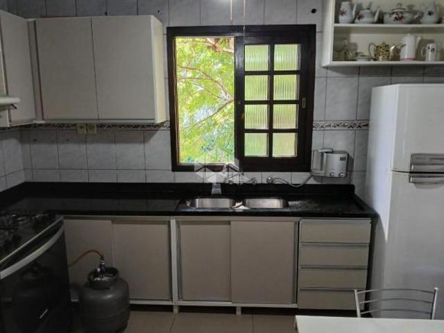 Ampla casa com piscina à venda no Morro Santana 400m², 4 quartos e dois terrenos!
