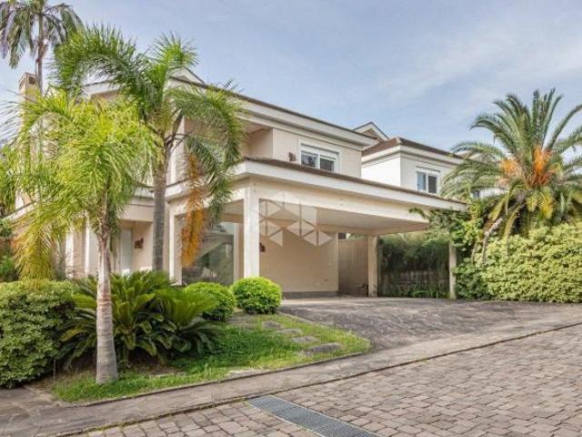 AMPLA CASA 3 DORMITÓRIOS / SUÍTES Á BEIRA DO RIO GUAÍBA!