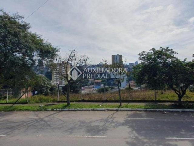 AMPLO TERRENO A VENDA NA AVENIDA PERIMETRAL BRUNO SEGALLA COM DUAS CASAS