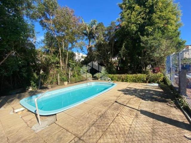 Amplo Terreno com casa mista