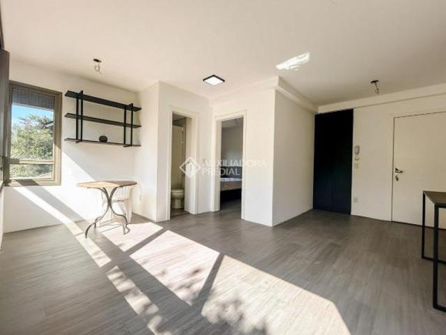 Amplo apartamento de 1 quarto com vaga, lareira e churrasqueira!
