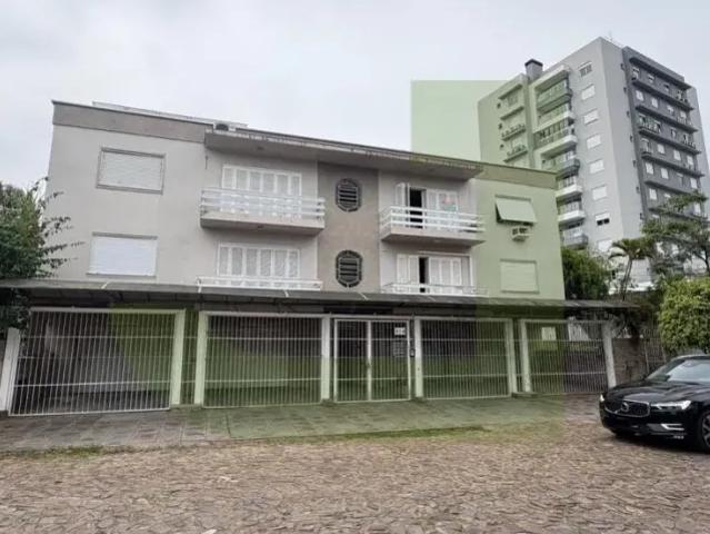 Amplo apartamento próximo ao centro da cidade, com 2 dormitórios, sacada e garagem