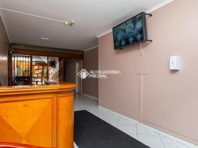 Amplo e ensolarado Apartamento de 1 quarto com garagem