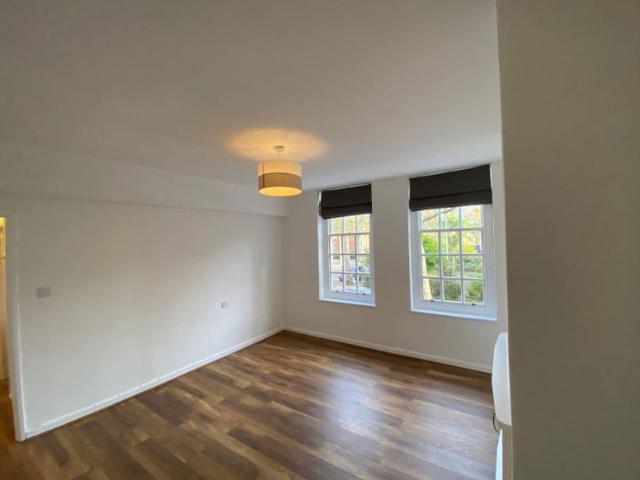 An unfurnished studio flat in prime location