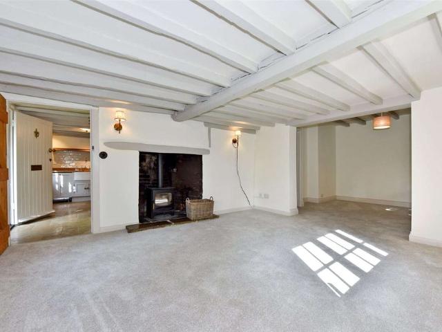 An attractive cottage in private grounds in an idyllic village