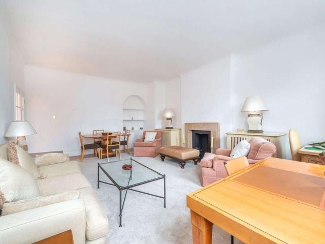 An elegant, two bedroom, two bathroom, 3rd & 4th floor duplex apartment, of approximately 1,175 sq ft/ 109.16 sq m, set in this period red brick conversion