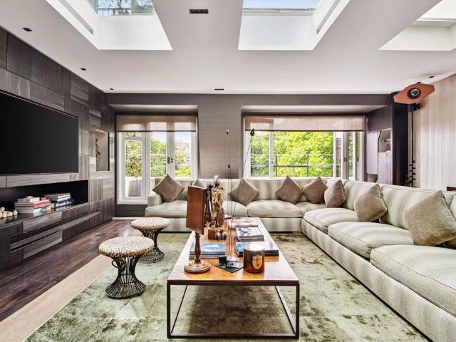 An elegant top floor apartment featuring a roof terrace, two balconies, and lift access, situated in a handsome Victorian conversion on a prime SW7 address